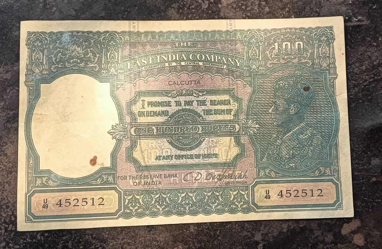 100 RS Rbf East India company eagle . C D Deshmukh signature ...